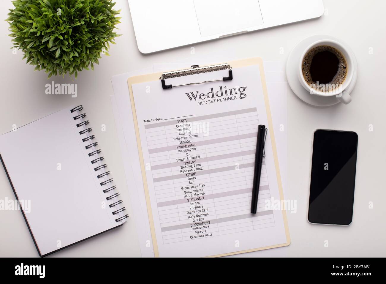 Office workplace with wedding planner and items to do Stock Photo - Alamy