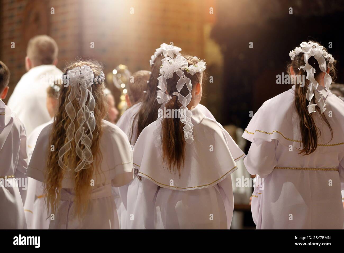 Children going to the first holy communion in the Catholic church Stock ...