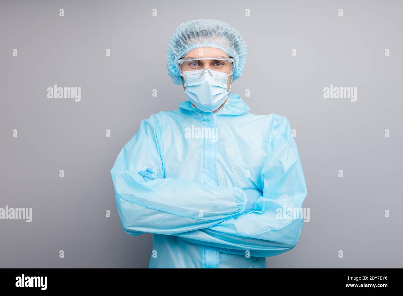 Photo of serious guy expert doc virology center clinic arms crossed ...
