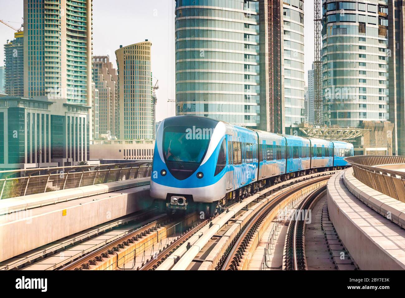 Dubai metro railway in a summer day in Dubai, United Arab Emirates ...