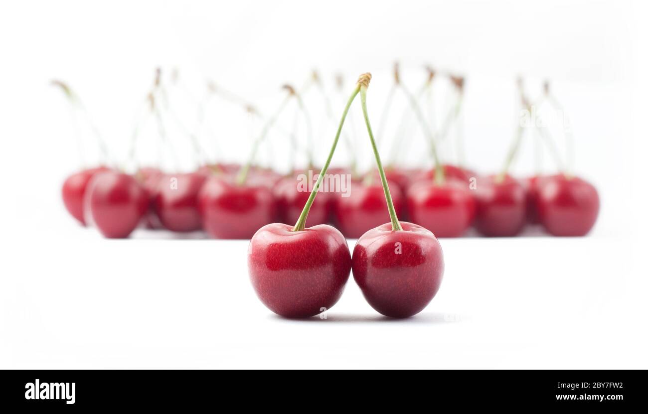Close up view of two cherries Cut Out Stock Images & Pictures - Alamy
