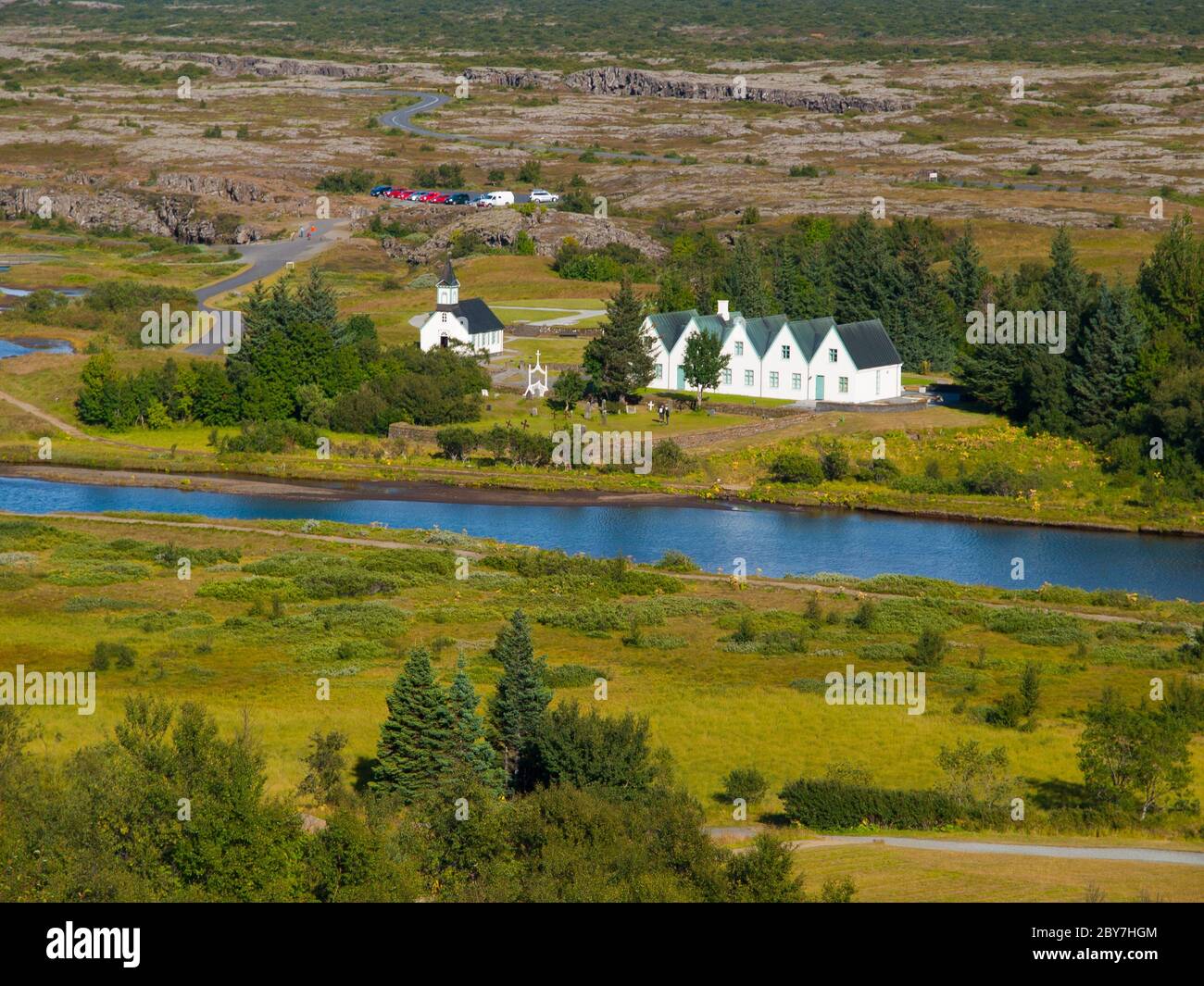 Typical rural icelandic church and group of houses in Thingvellir ...