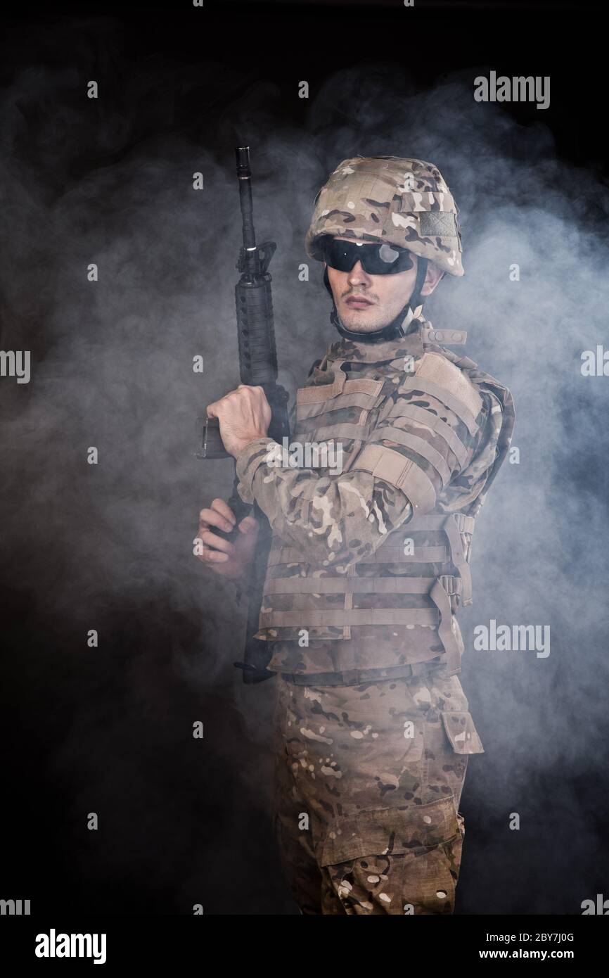 Modern soldier with rifle Stock Photo - Alamy