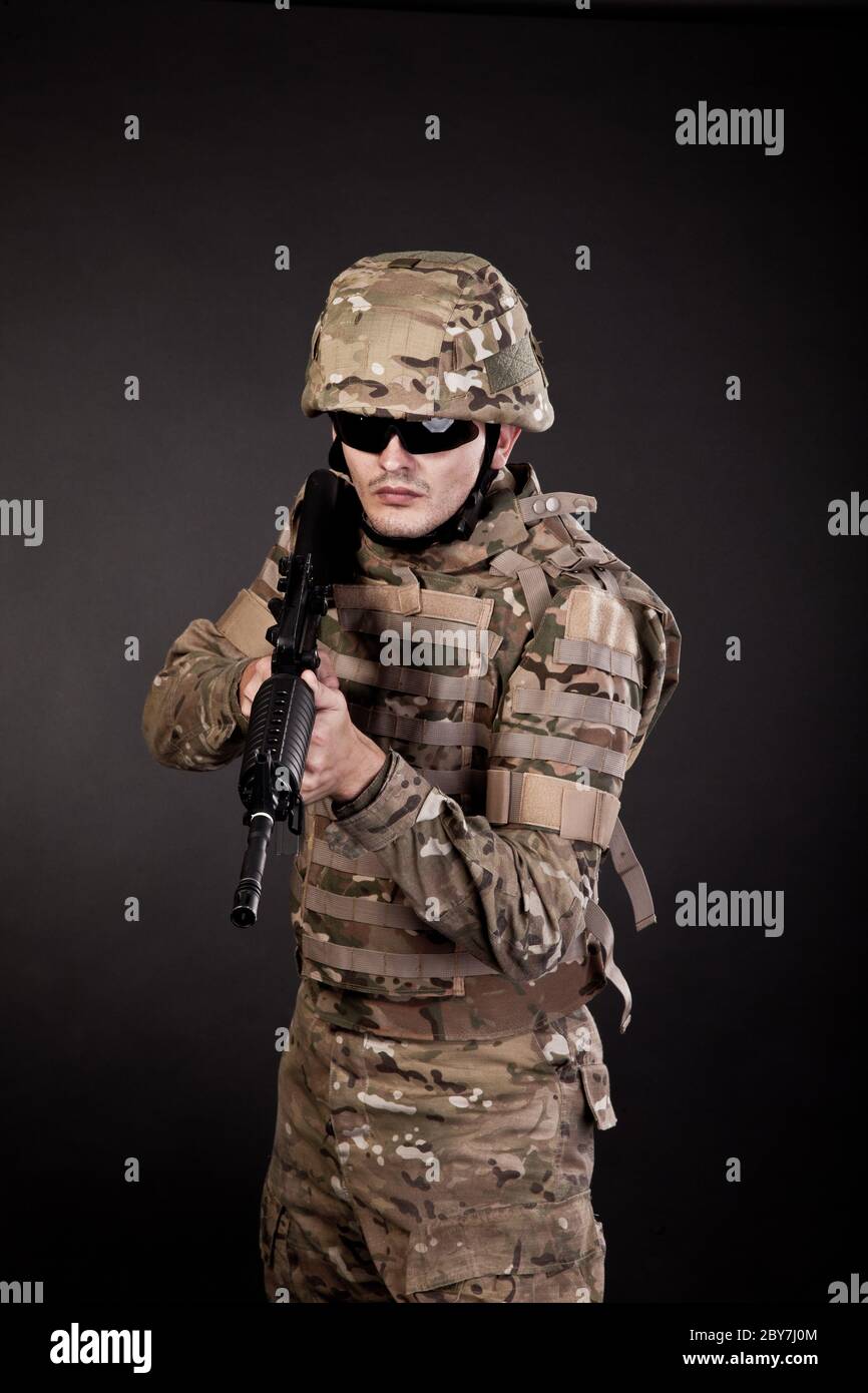 Modern soldier with rifle Stock Photo - Alamy