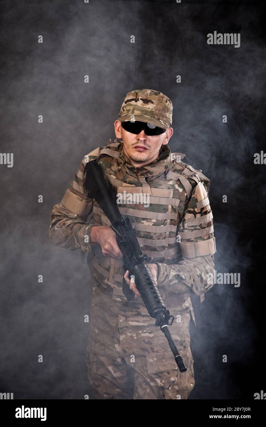 Modern soldier with rifle Stock Photo - Alamy