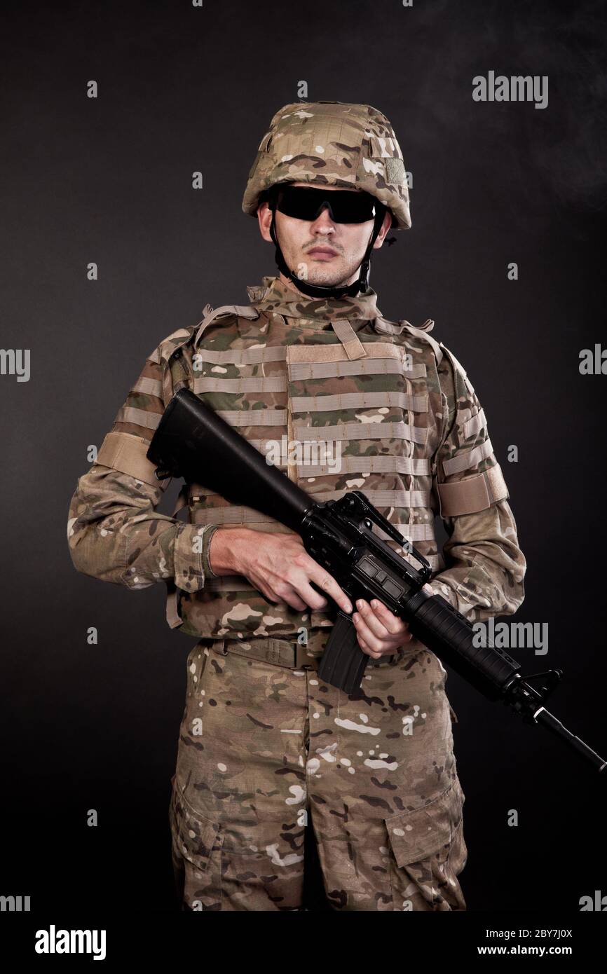 Modern soldier with rifle Stock Photo - Alamy