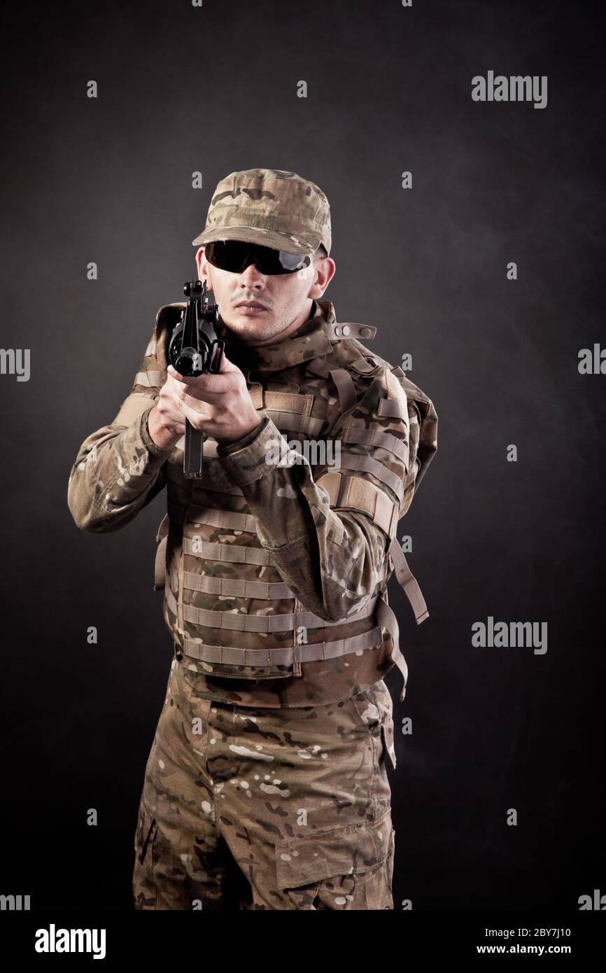 Modern soldier with rifle Stock Photo - Alamy