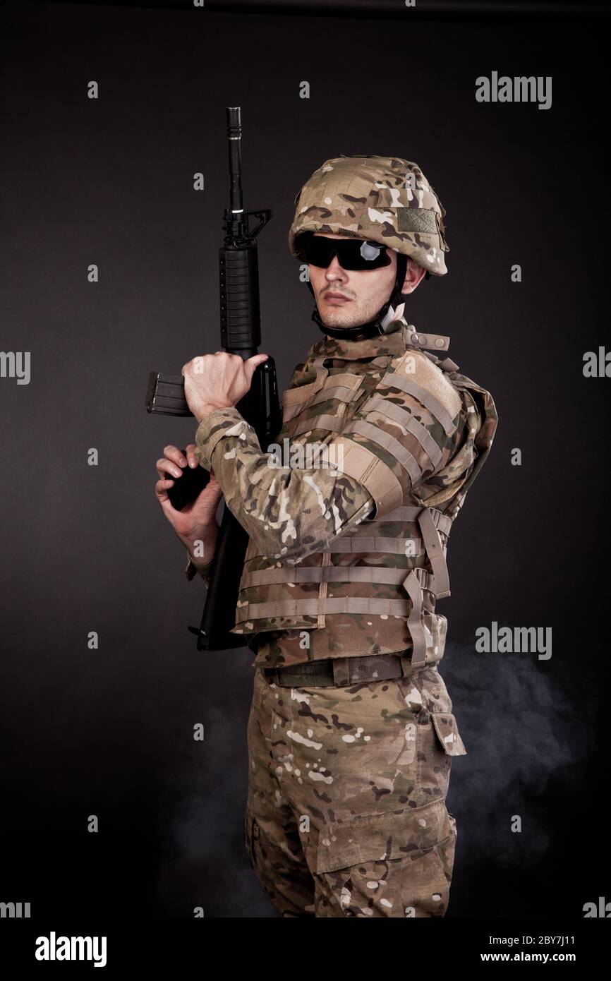 Modern soldier with rifle Stock Photo - Alamy