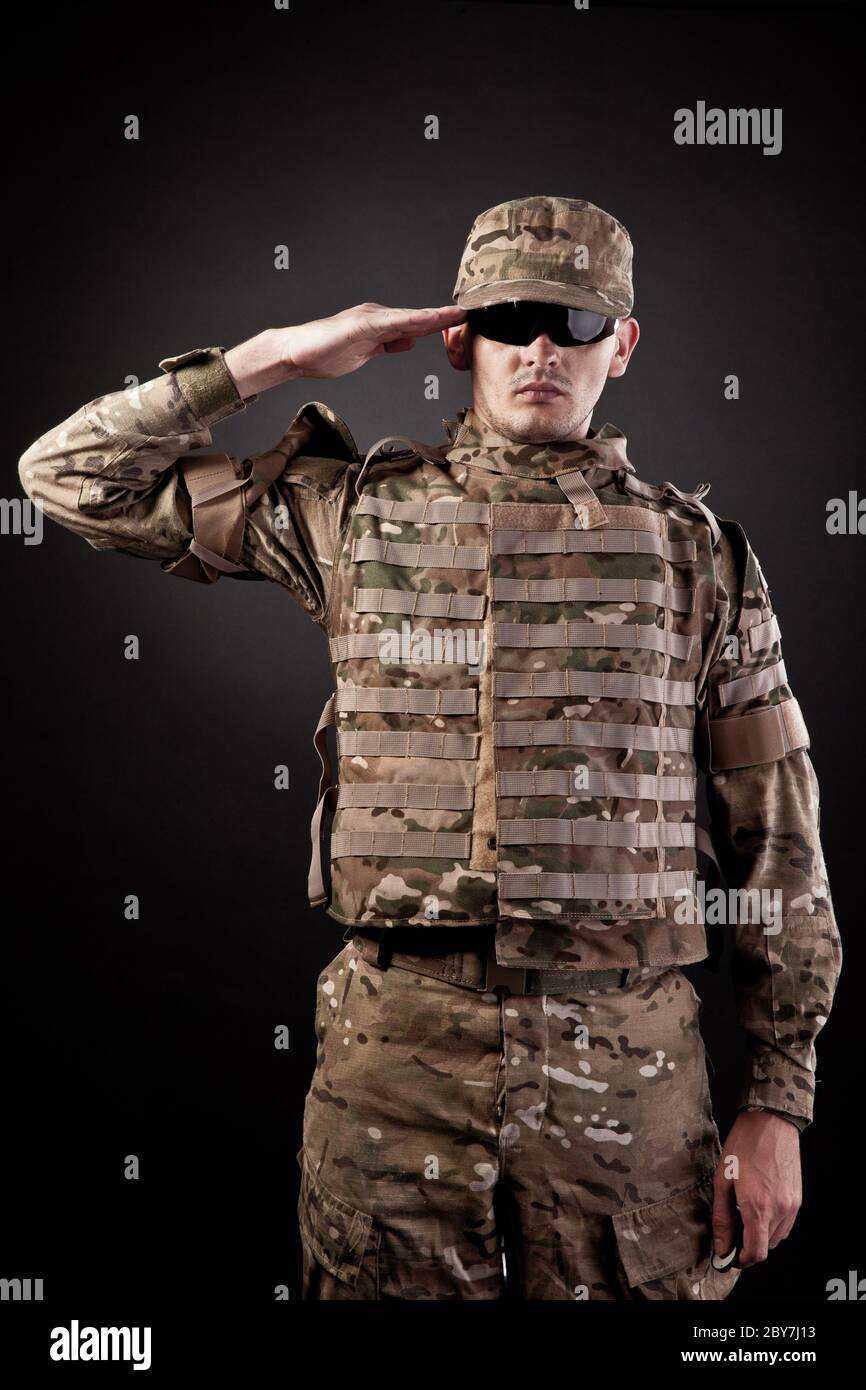 Army soldier saluting Stock Photo - Alamy