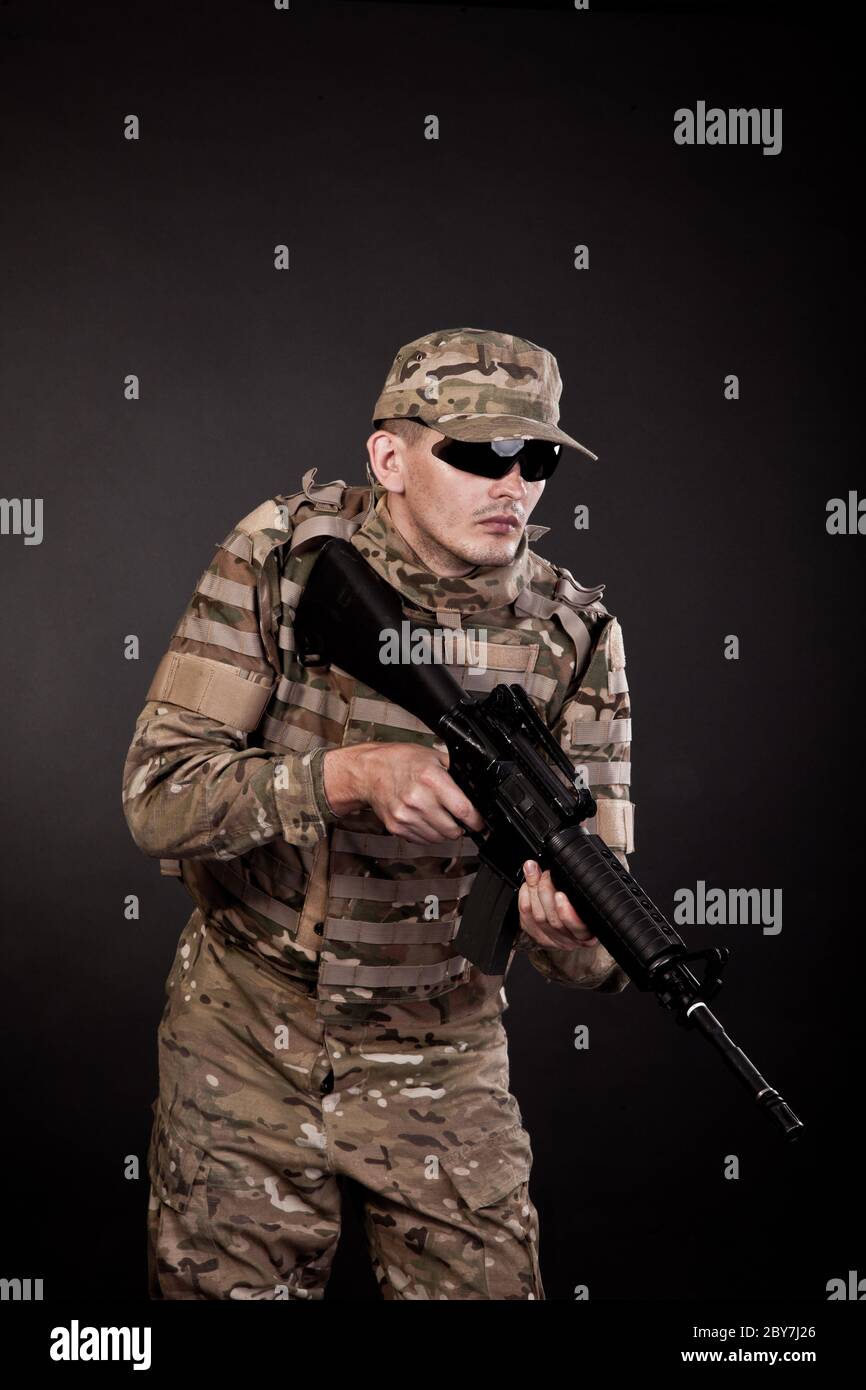 Modern soldier with rifle Stock Photo - Alamy