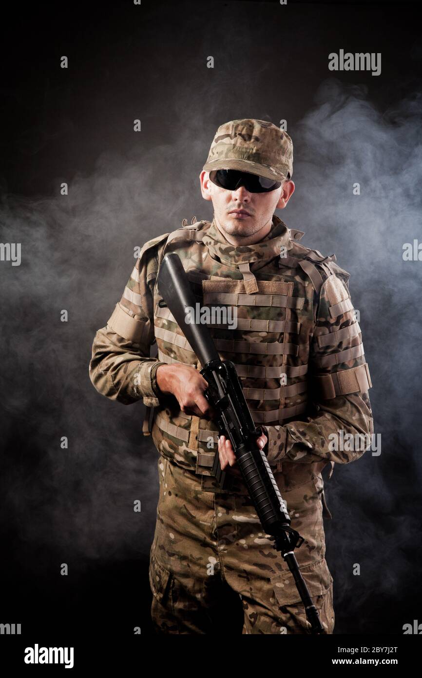 Modern soldier with rifle Stock Photo - Alamy