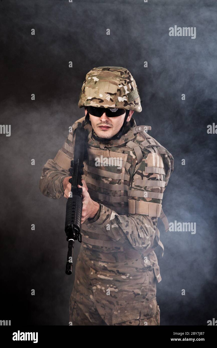 Modern soldier with rifle Stock Photo - Alamy