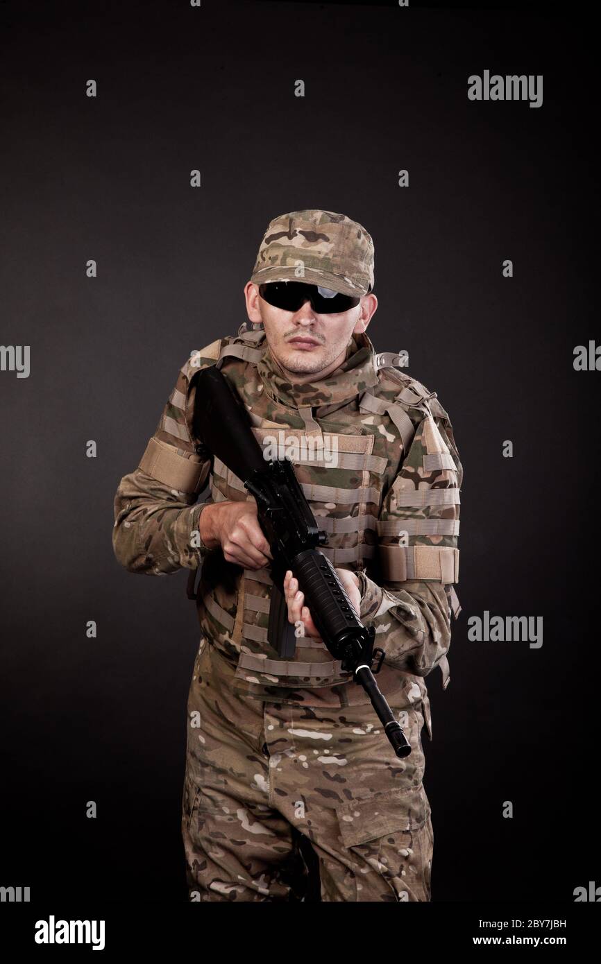 Modern soldier with rifle Stock Photo - Alamy
