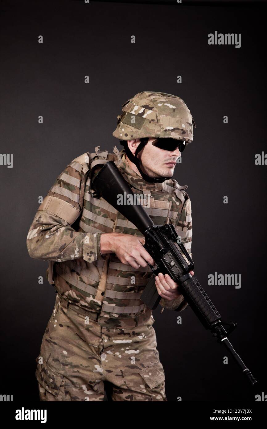 Modern soldier with rifle Stock Photo - Alamy