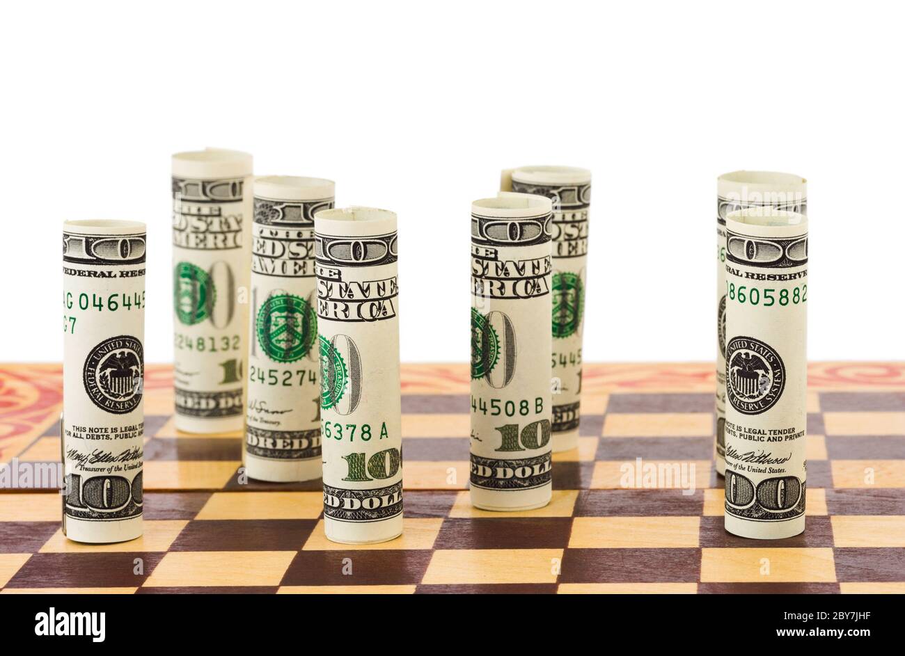 Money on chess board Stock Photo - Alamy