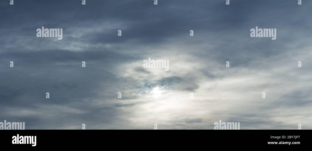 Panorama of a majestic gray sky with sun over horizon. High resolution ...