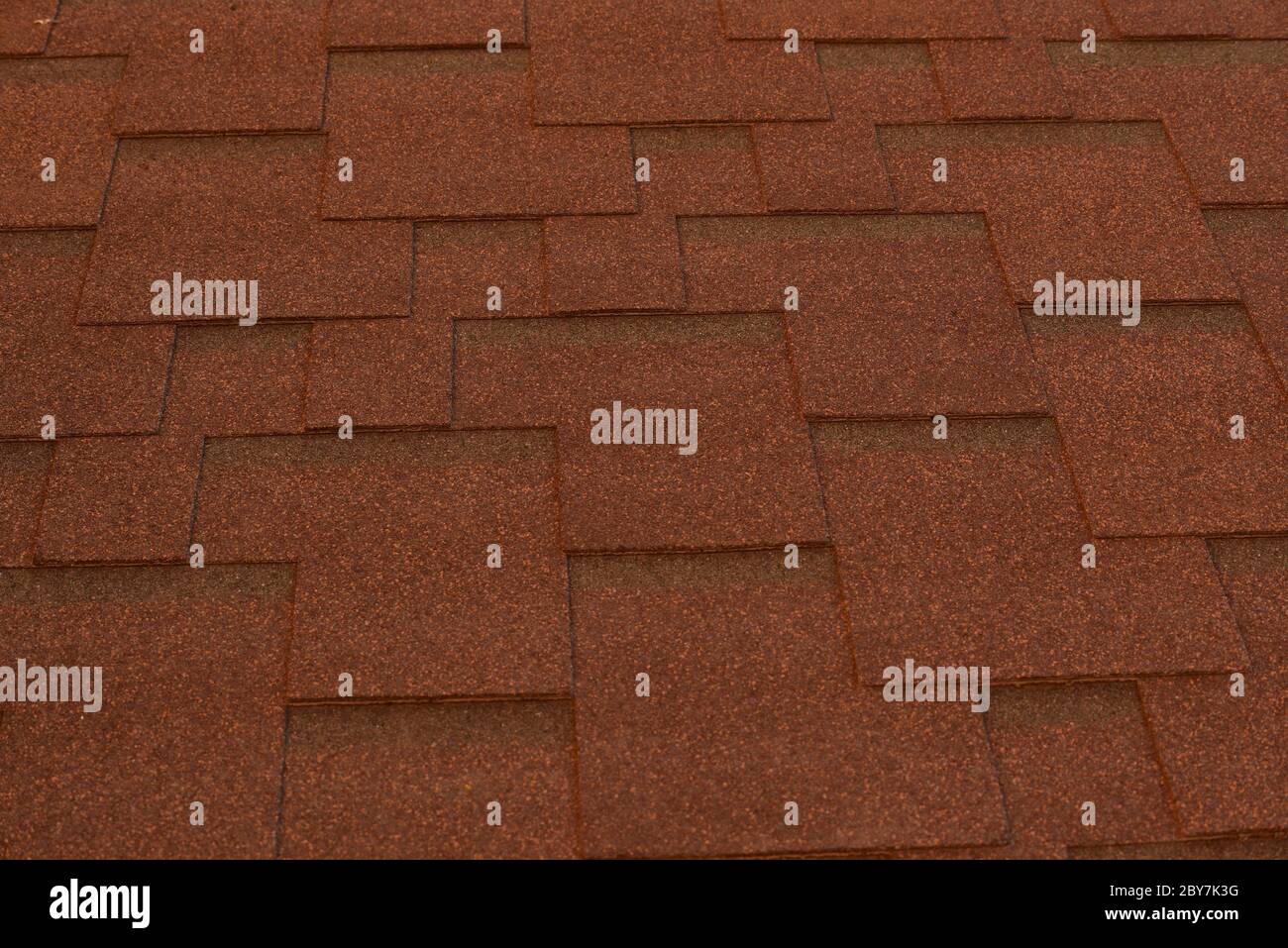 red roof. Metal tile. Part of the house roof as a backdrop for ...