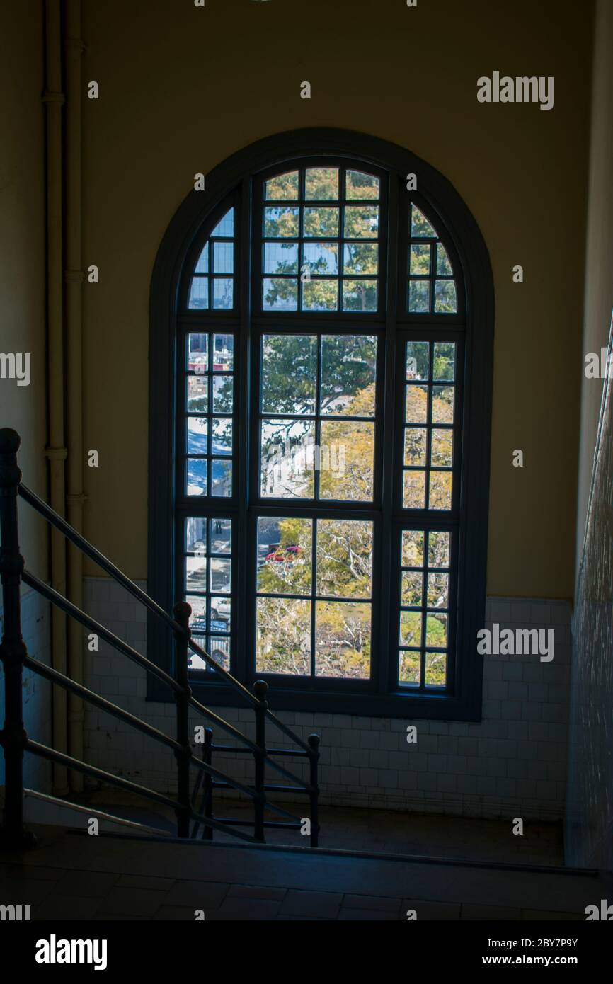 an old big window and a stairs in a historical building Stock Photo - Alamy