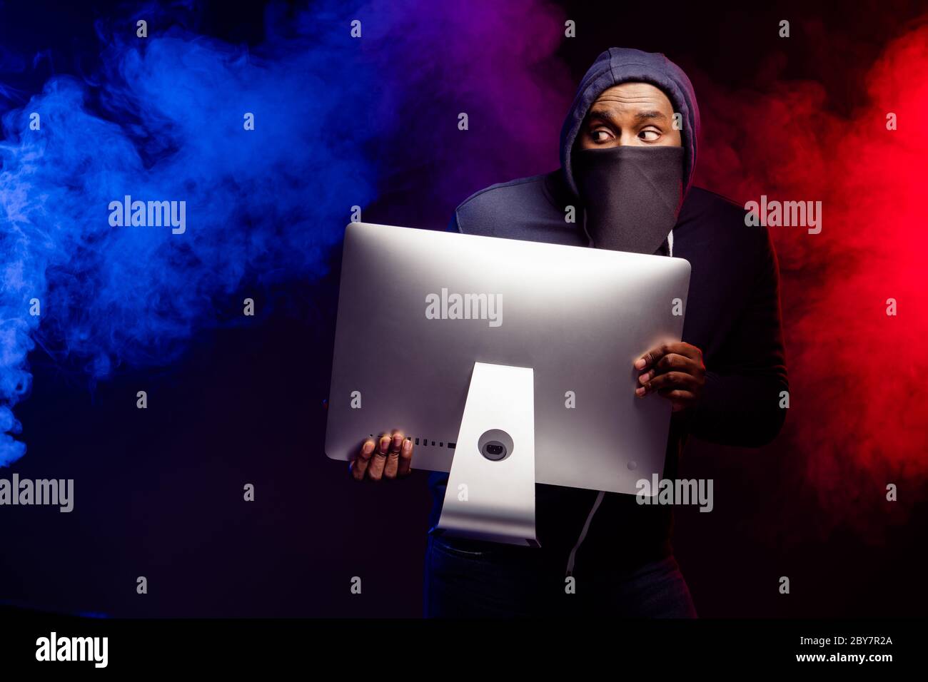 Photo of worried scared afro american guy rob computer pc screen look ...