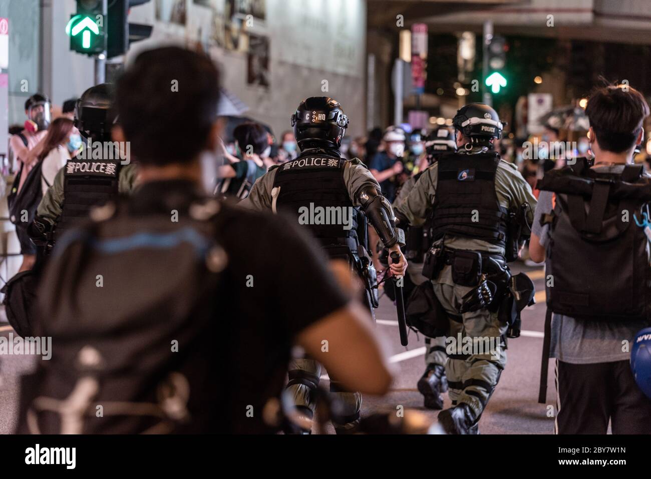 Hong Kong SAR, China. 9th June 2020. Hong Kong riot police storm into ...