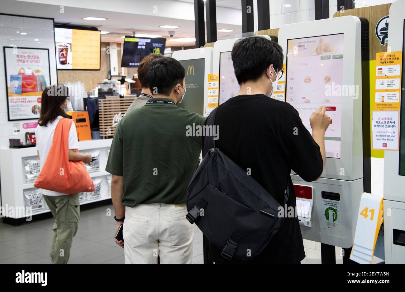 Seoul, South Korea. 9th June, 2020. A customer orders a burger at a ...
