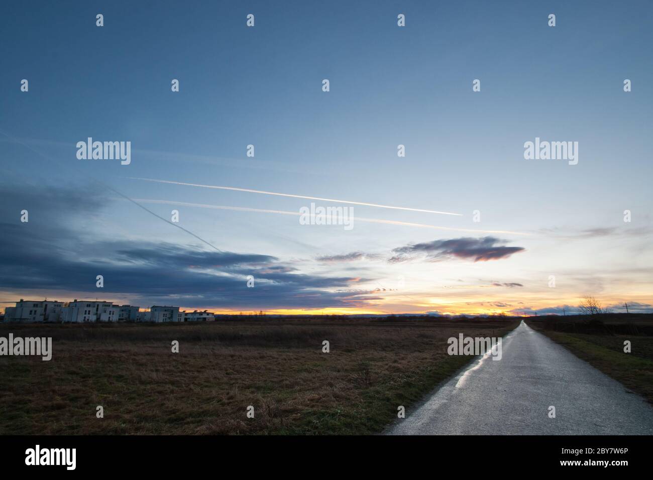 Lane beside some houses Stock Photo - Alamy