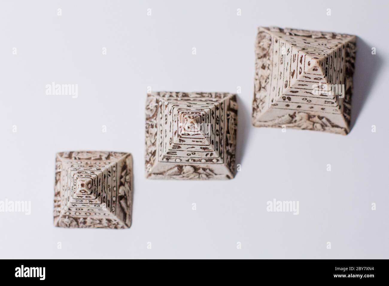 figurines of egyptian pyramids souvenir on white Stock Photo - Alamy