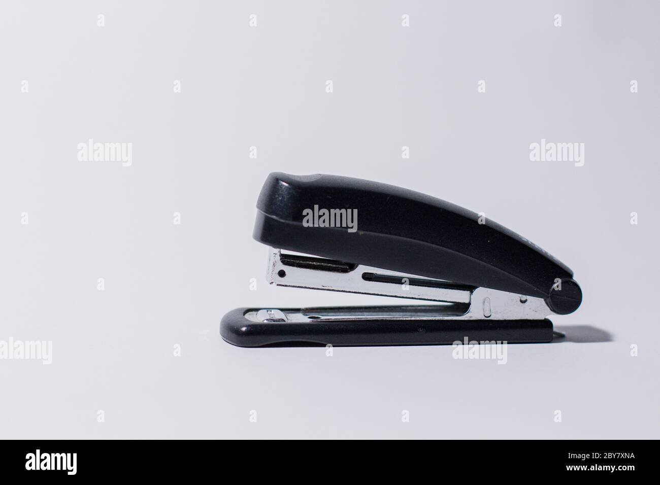 black stapler on white background Stock Photo - Alamy