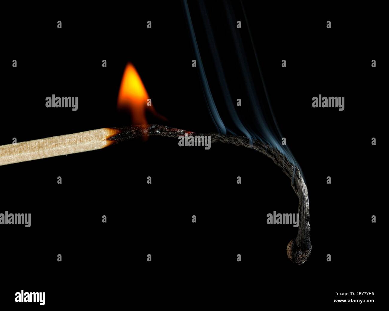 Closeup of burning match, black background Stock Photo - Alamy