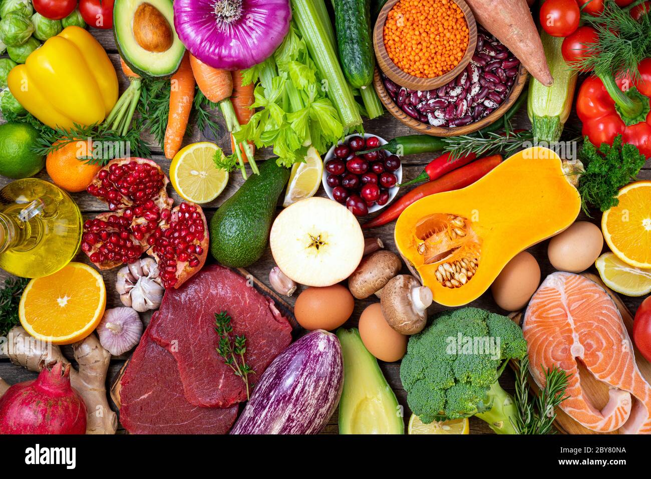 Background healthy food. Fresh vegetables, fruits, meat and fish on ...
