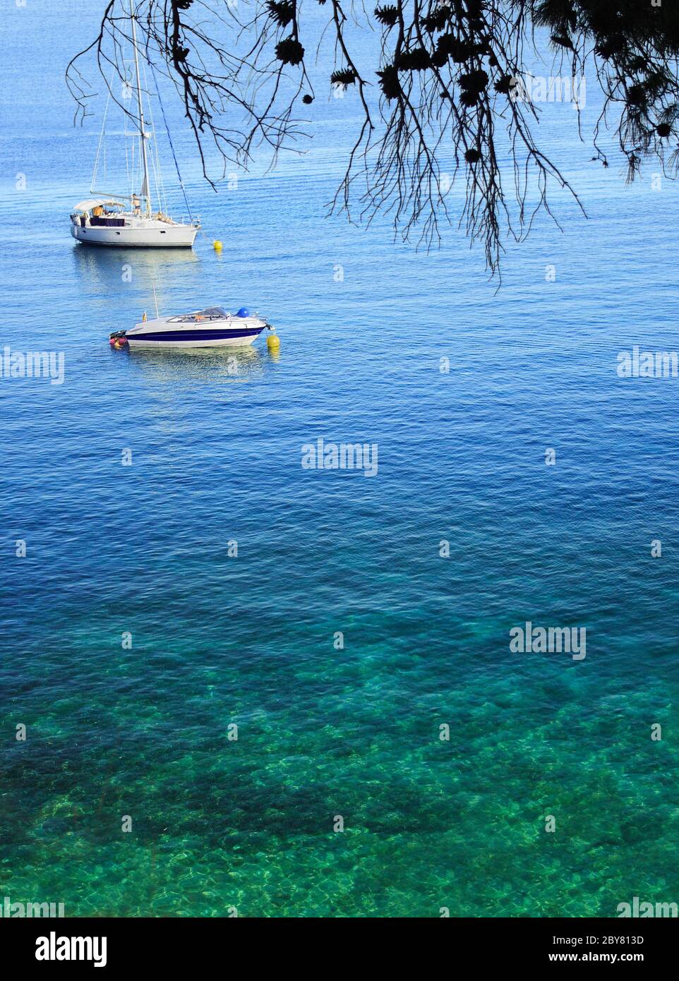 The small boats in the large sea Stock Photo - Alamy