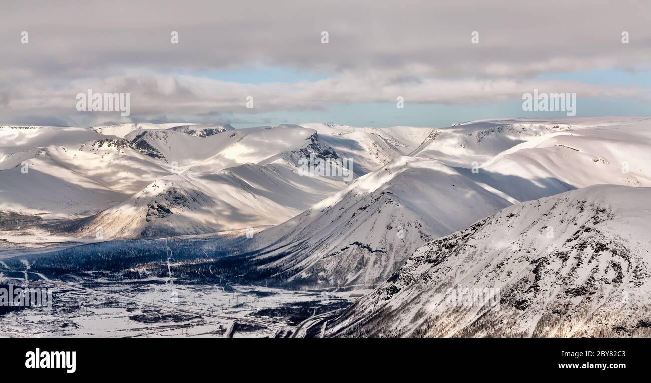 Landscape snowy mountain valley Stock Photo - Alamy