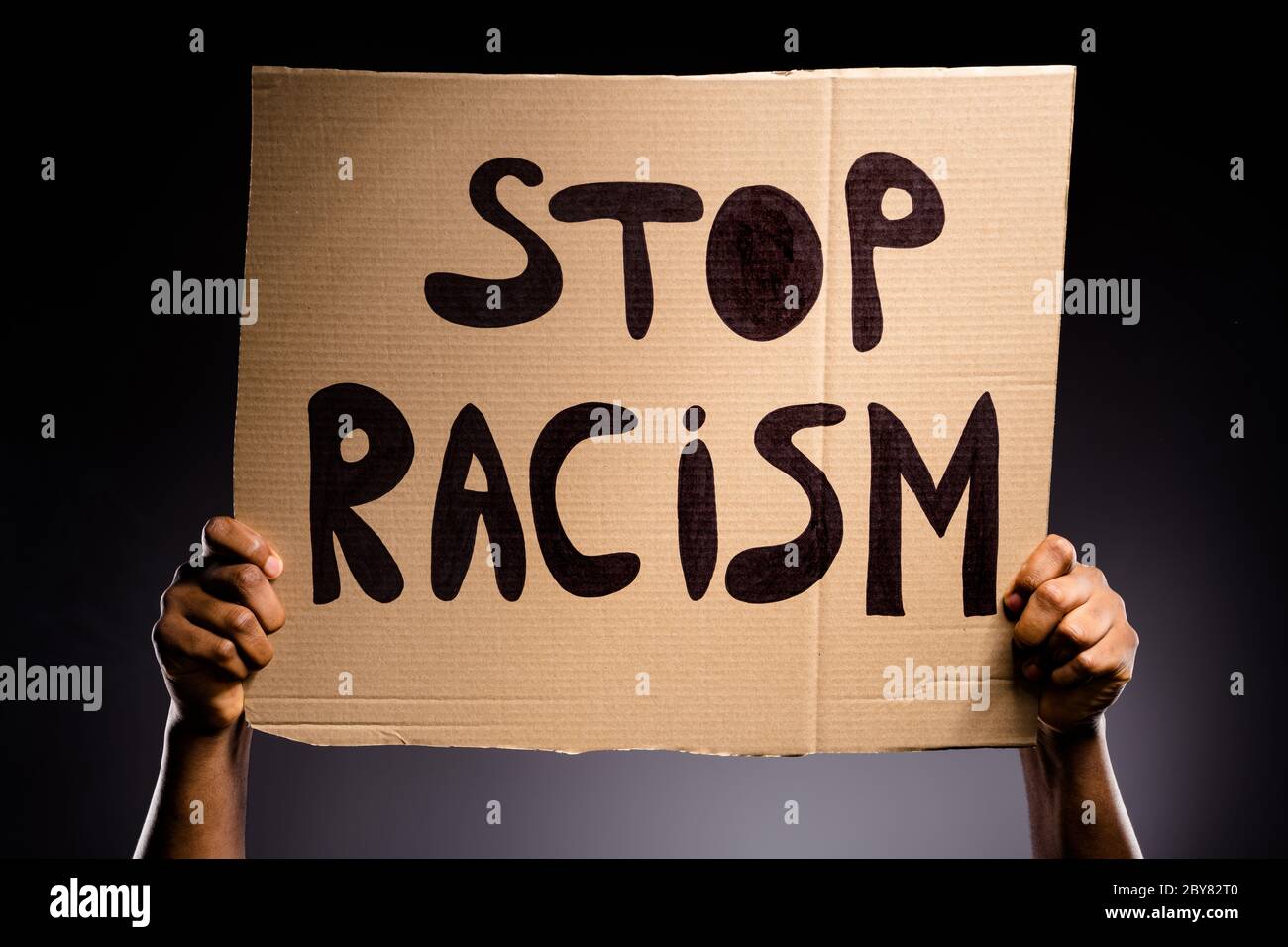Close up photo of afro american person hand hold cardboard banner ask ...