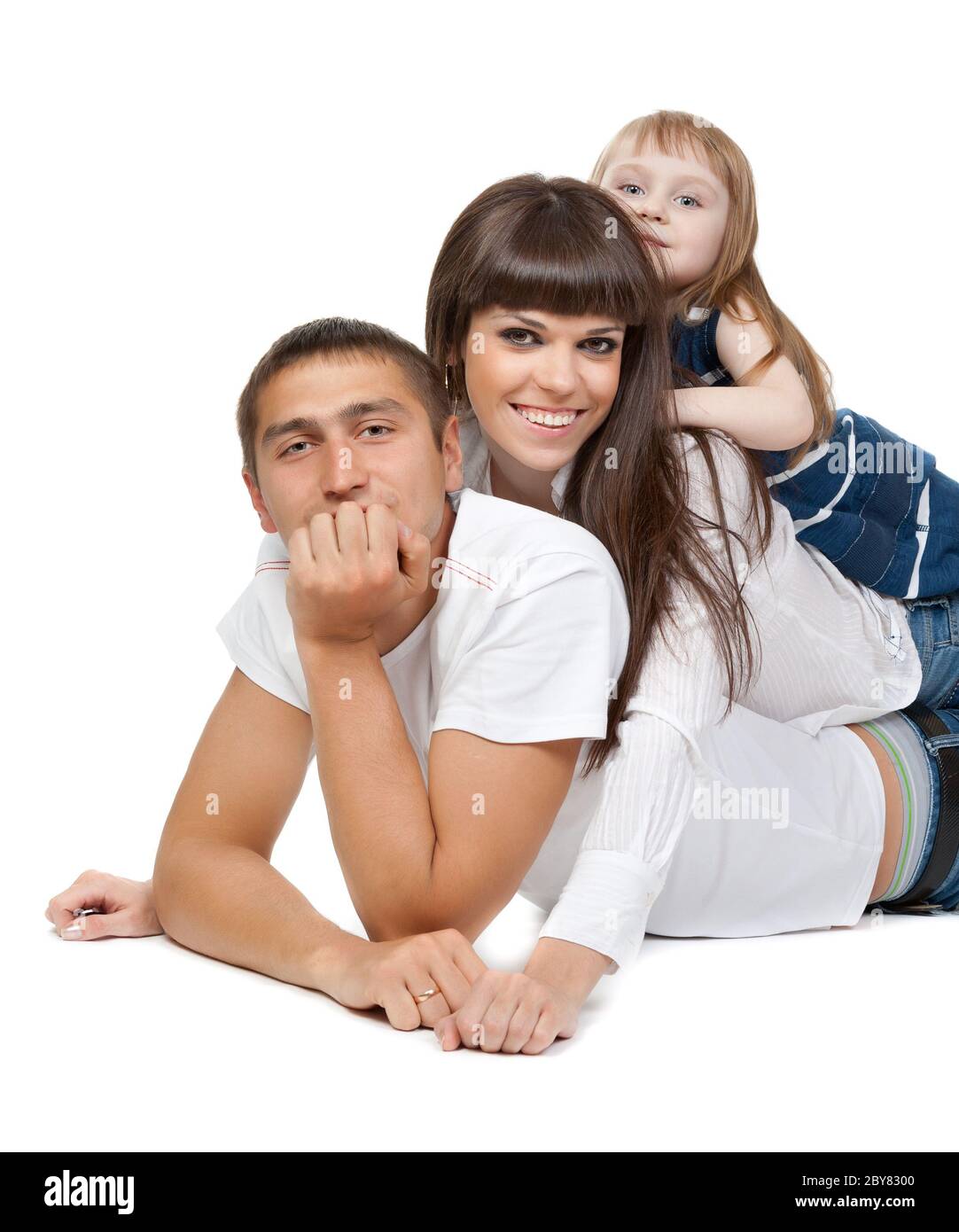 Happy family looking at the camera on their floor Stock Photo - Alamy