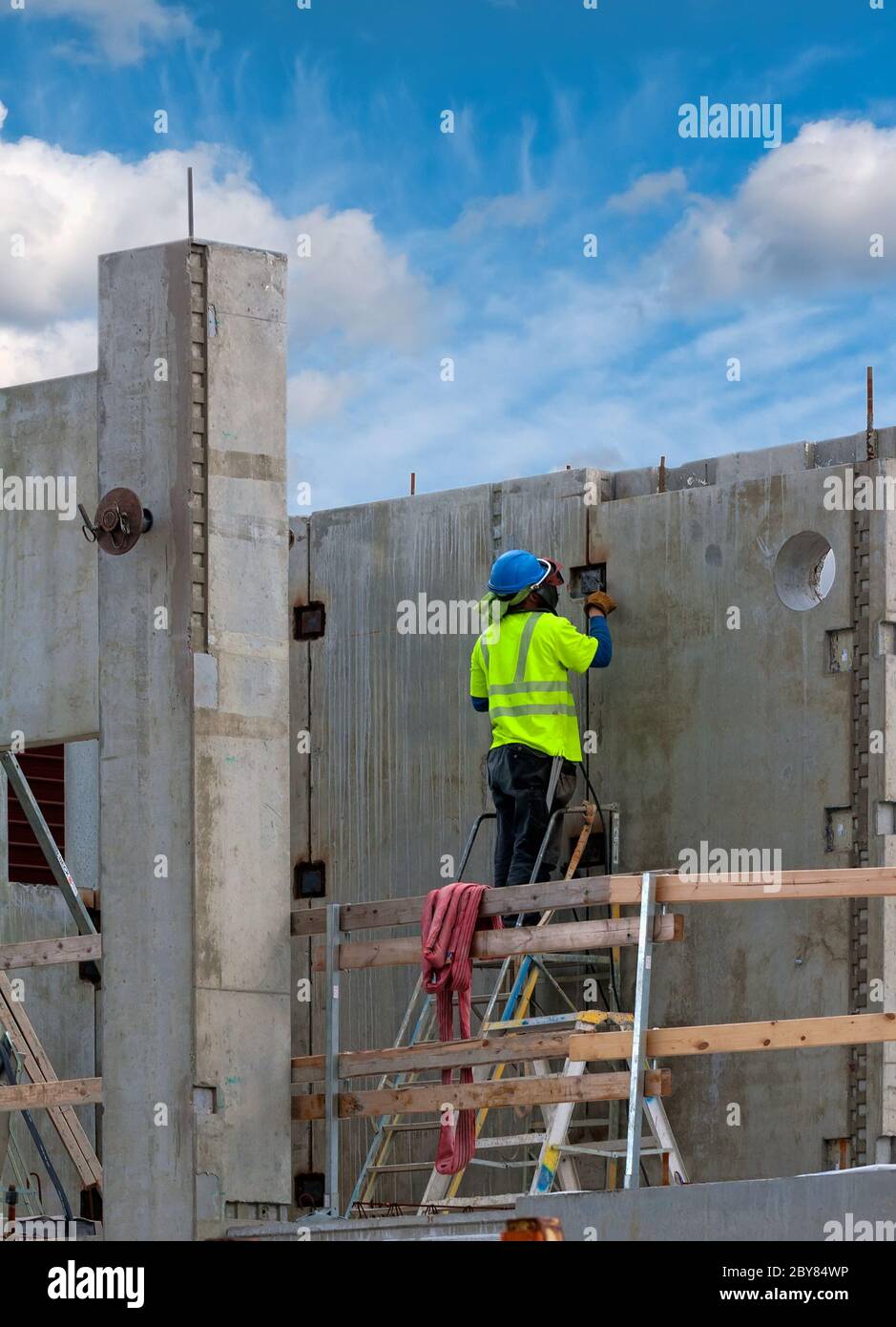 Person in green jacket hi-res stock photography and images - Alamy