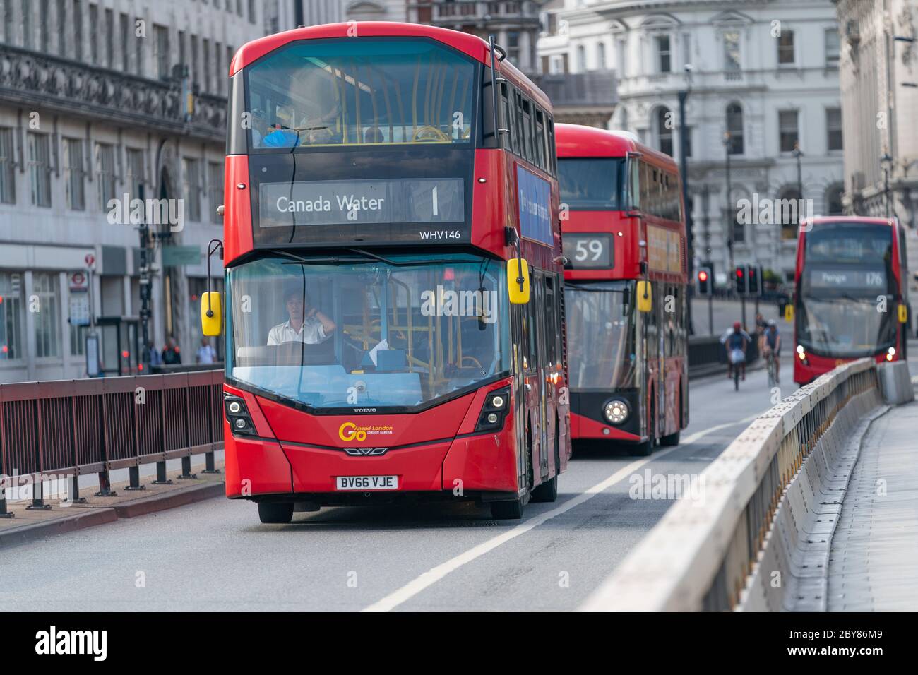 Driver of a Double Decker Red London Bus Route 1 driving during ...