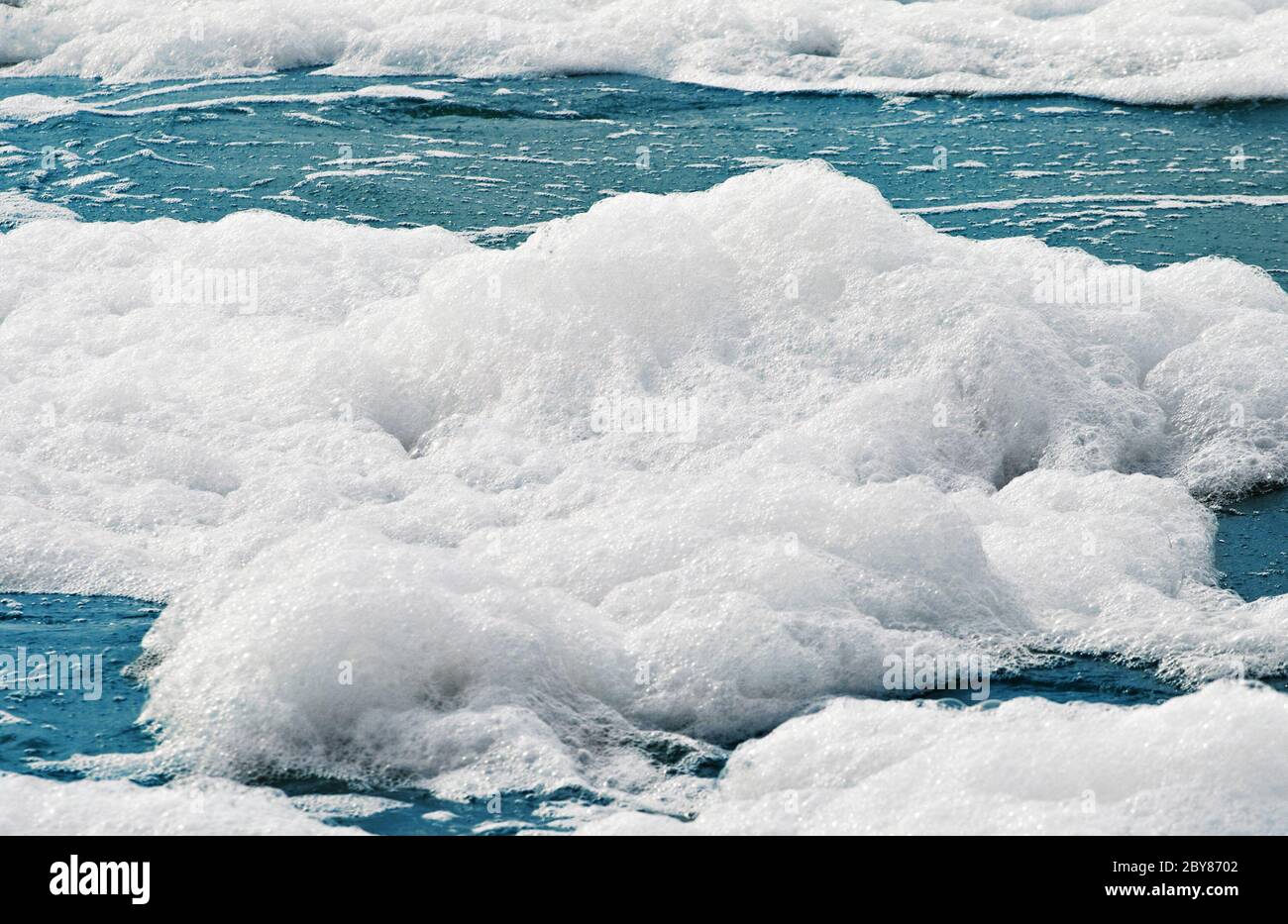White foam on a sea water surface Stock Photo - Alamy