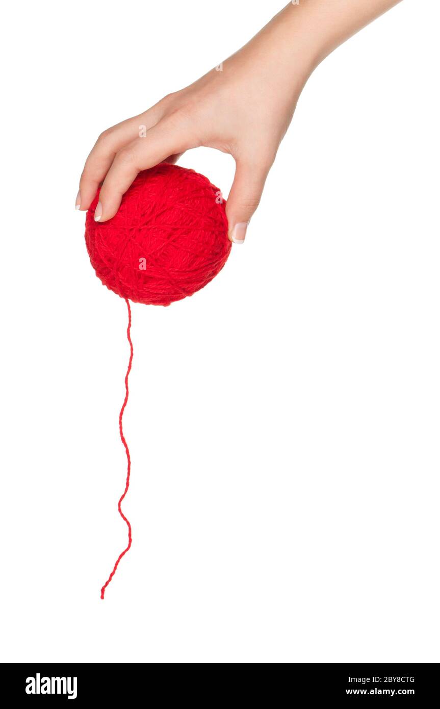 Hand with red ball Stock Photo - Alamy
