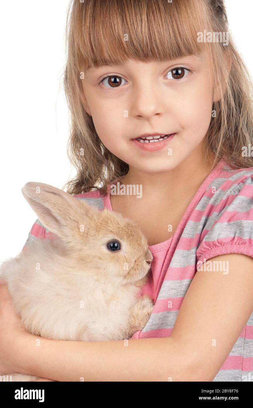 Little girl with rabbit Stock Photo - Alamy