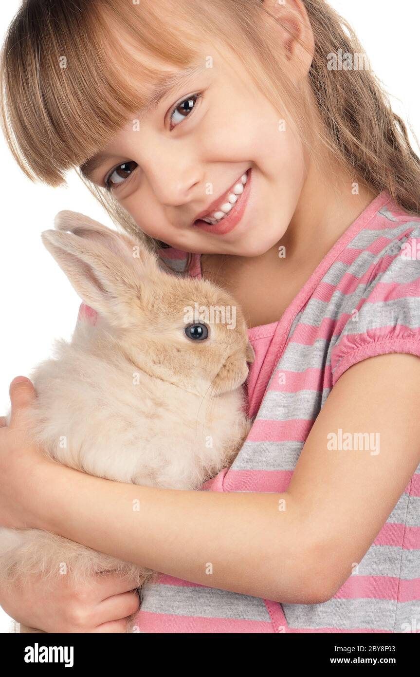 Little girl with rabbit Stock Photo - Alamy