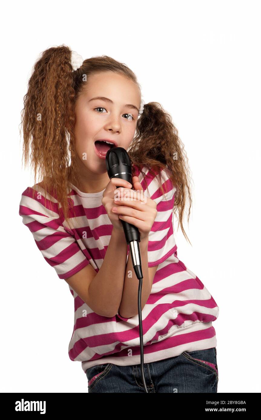 Girl with microphone Stock Photo - Alamy