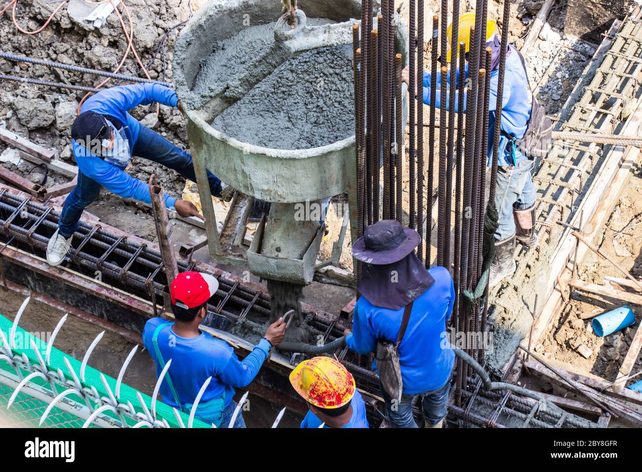 BANGKOK, THAILAND - FEBRUARY 5, 2019: Worker pouring cement pouring ...