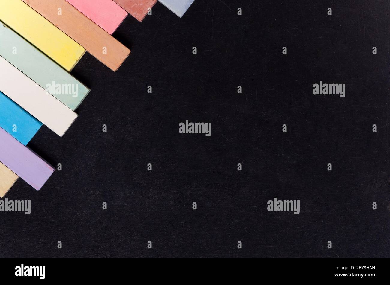 Chalkboard with colorful chalk Stock Photo - Alamy
