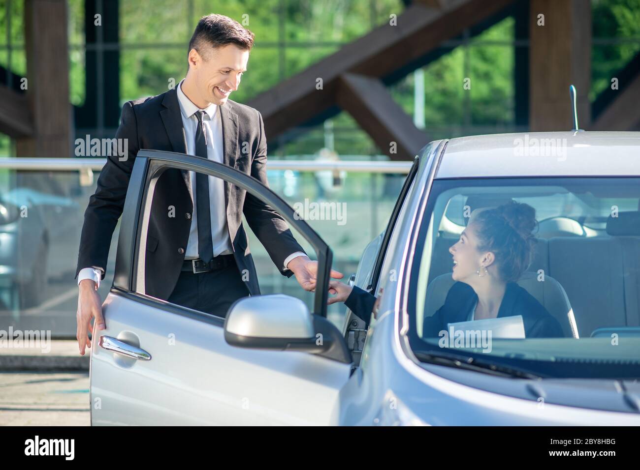 Man sitting in door opening hi-res stock photography and images - Alamy