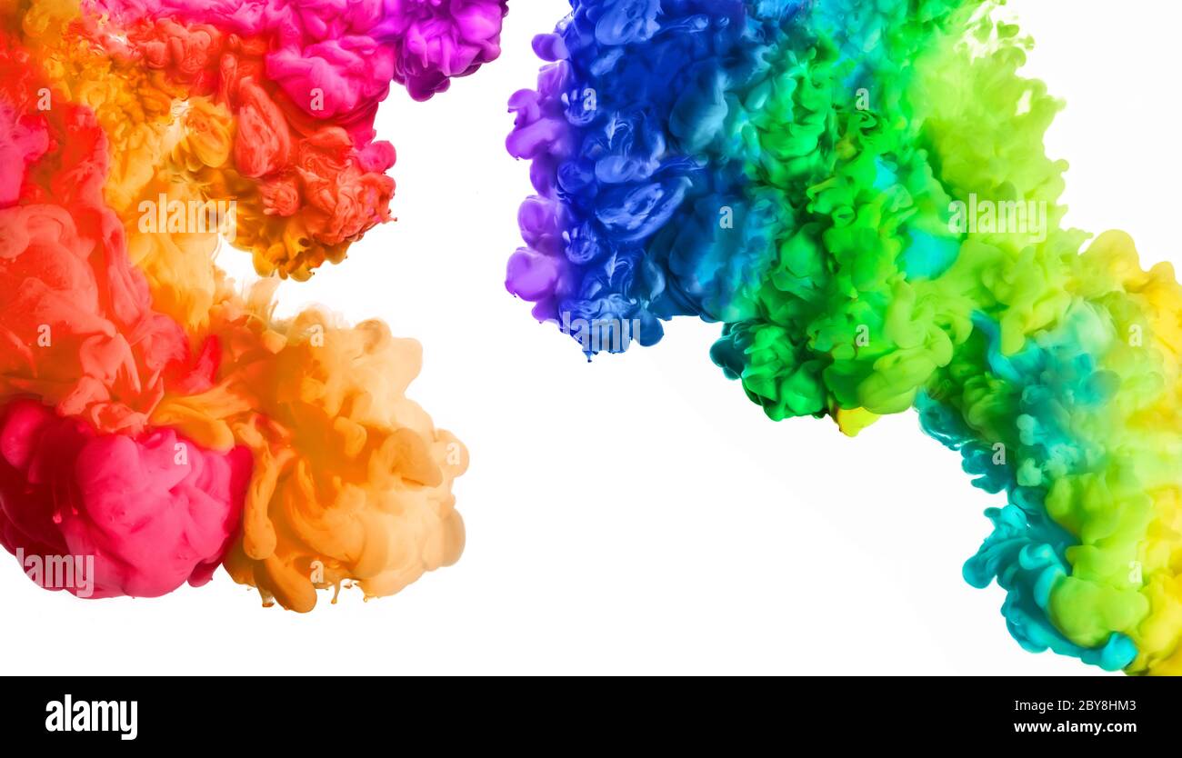 Ink in water isolated on white background. Rainbow of colors. Colors ...