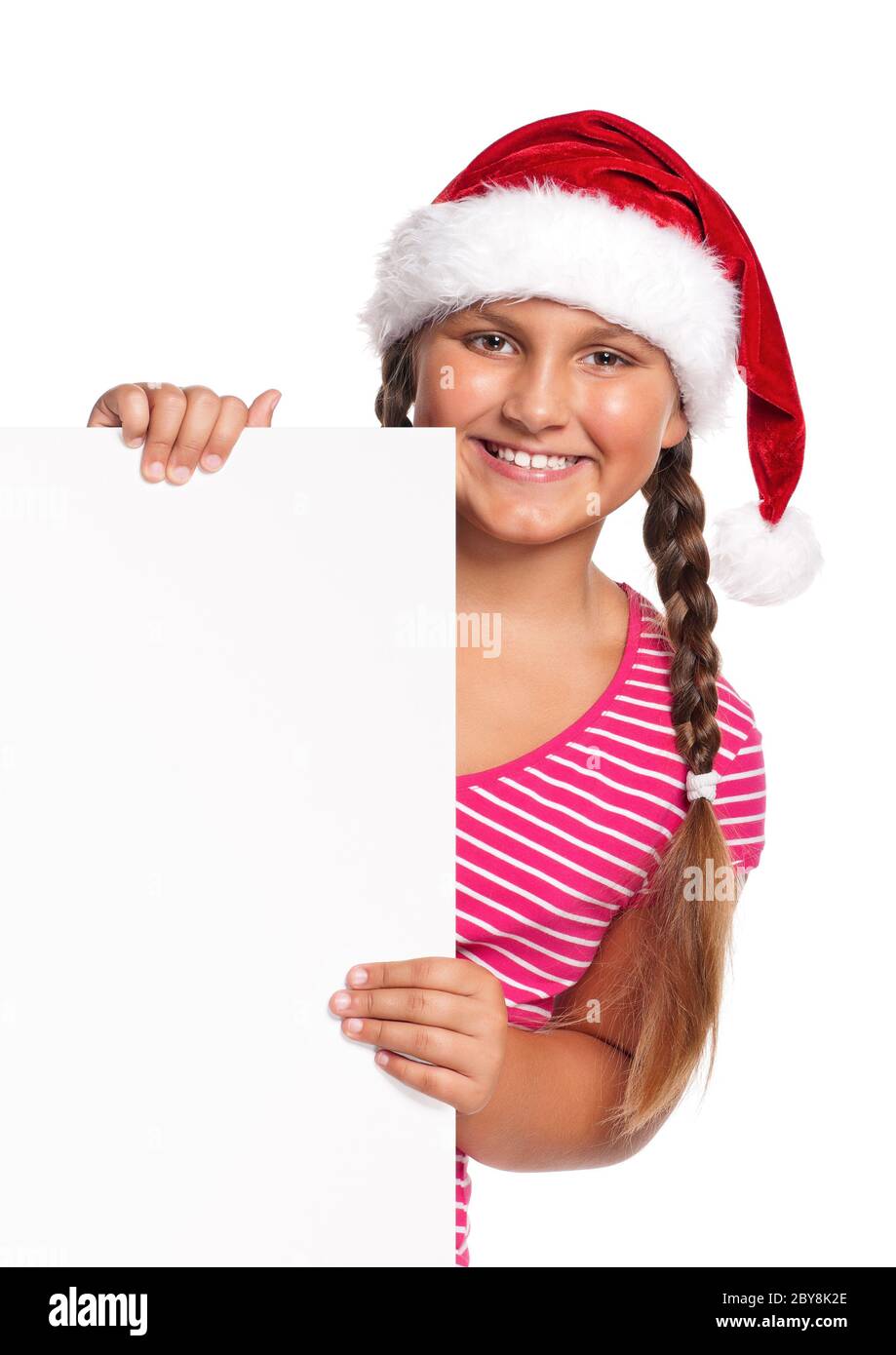 Girl in Santa hat Stock Photo - Alamy