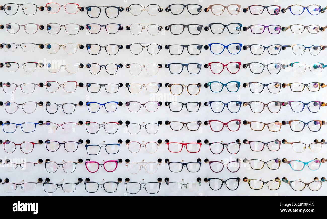dioptric glasses on the shelf of an optometric clinic and glasses store ...