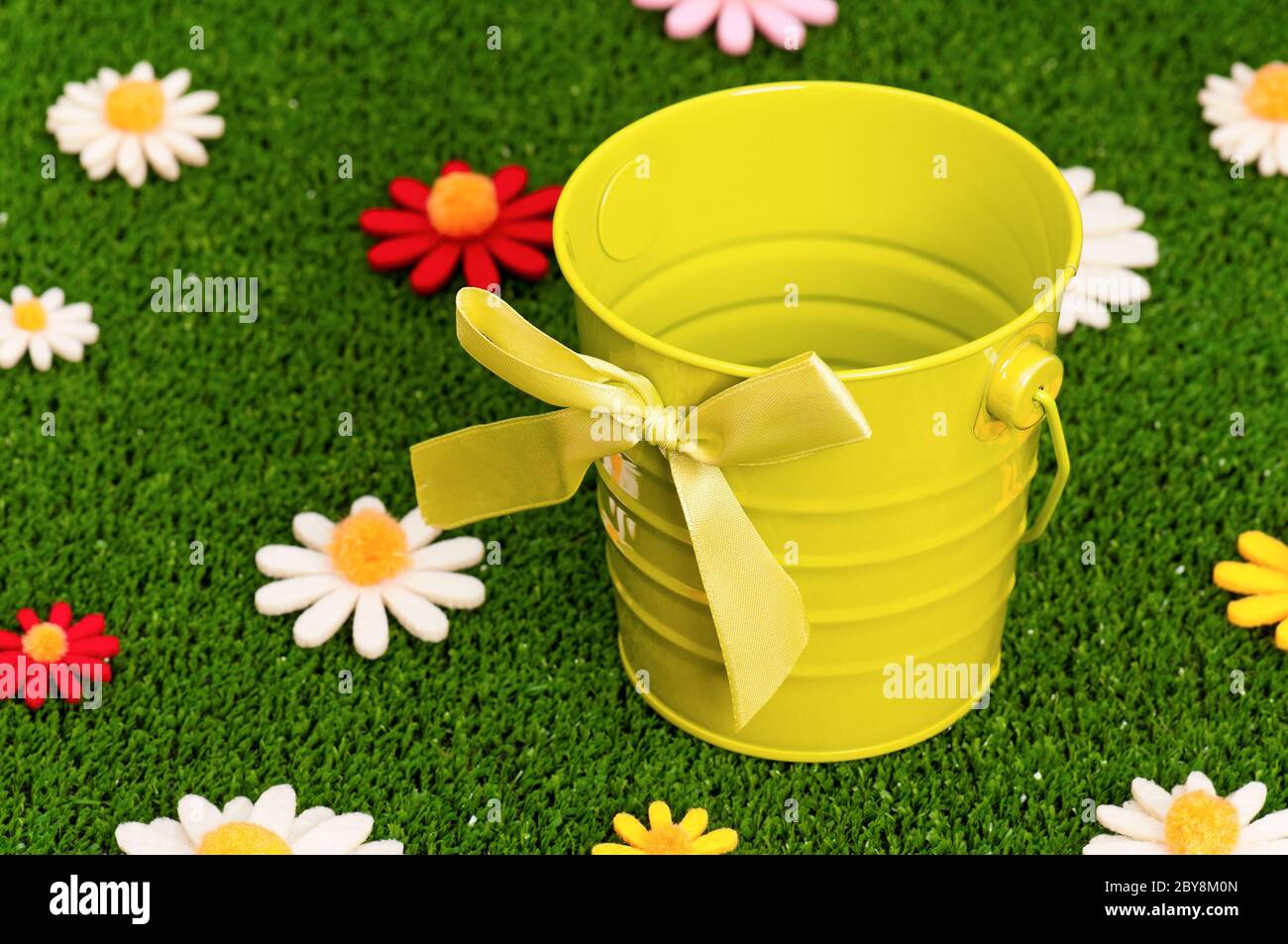 Small yellow bucket green hi-res stock photography and images - Alamy
