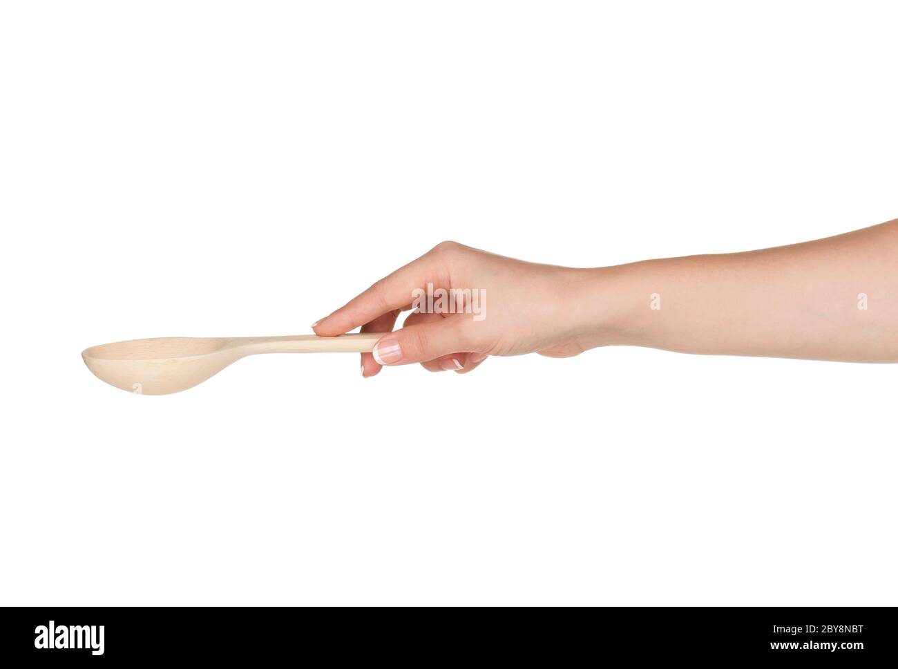 Hand with spoon Stock Photo - Alamy