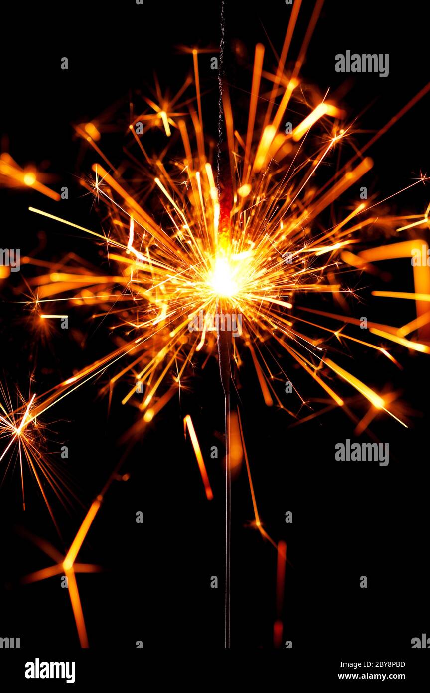 Lighting up sparkler close hi-res stock photography and images - Alamy